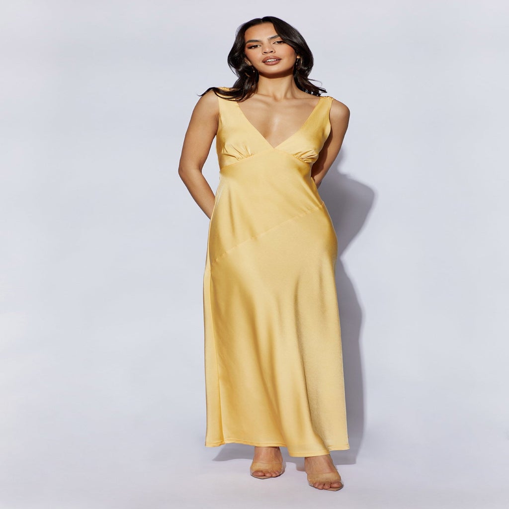 Channel Your Inner Andie Anderson In These Iconic Yellow Dresses