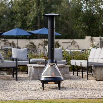 TIKI Brand 70 Inch Chiminea Outdoor Fireplace and Pellet Hopper | Costco